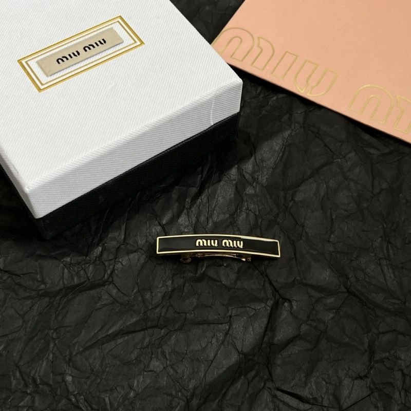 Indistinguishable Miu Miu Hairpins