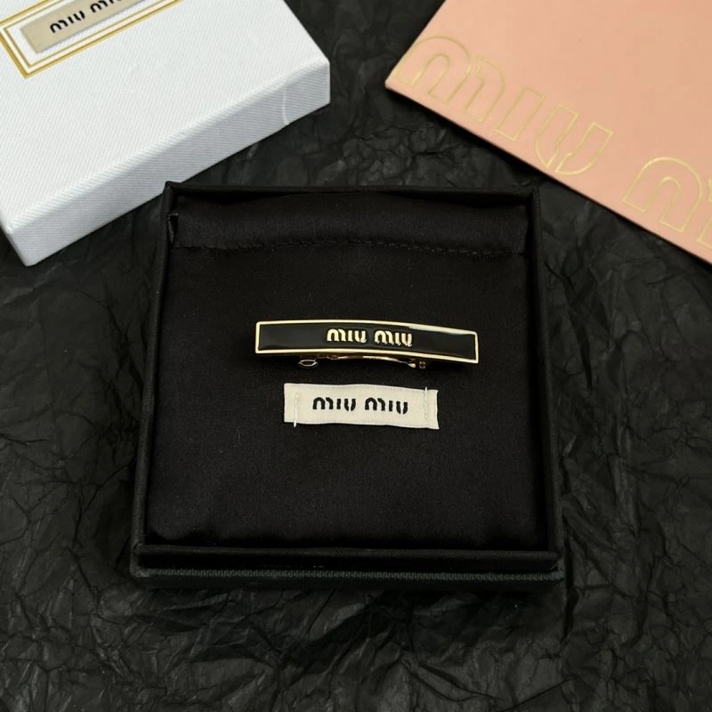 Indistinguishable Miu Miu Hairpins