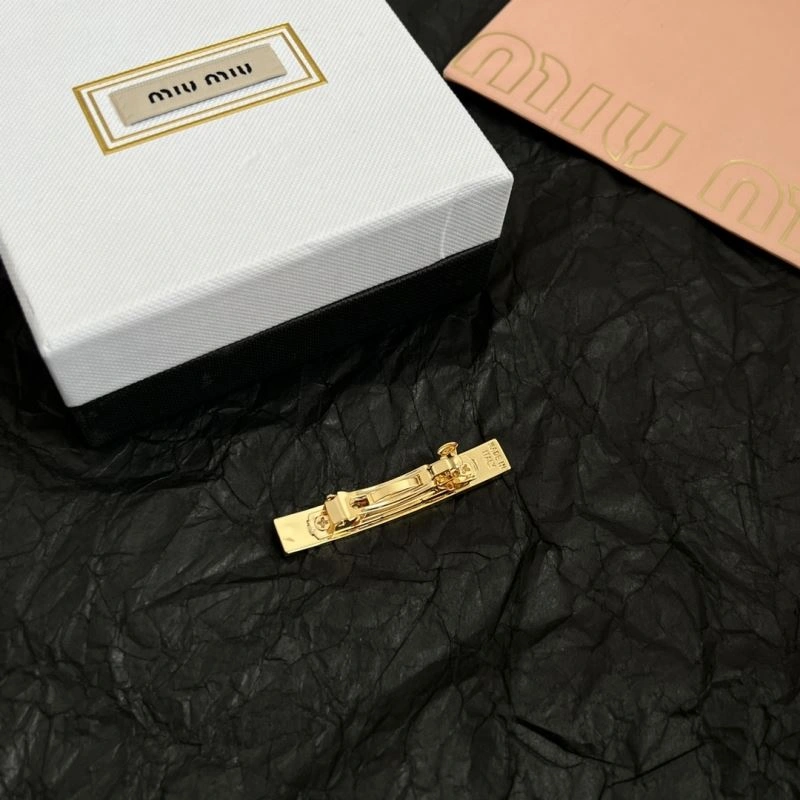 Indistinguishable Miu Miu Hairpins