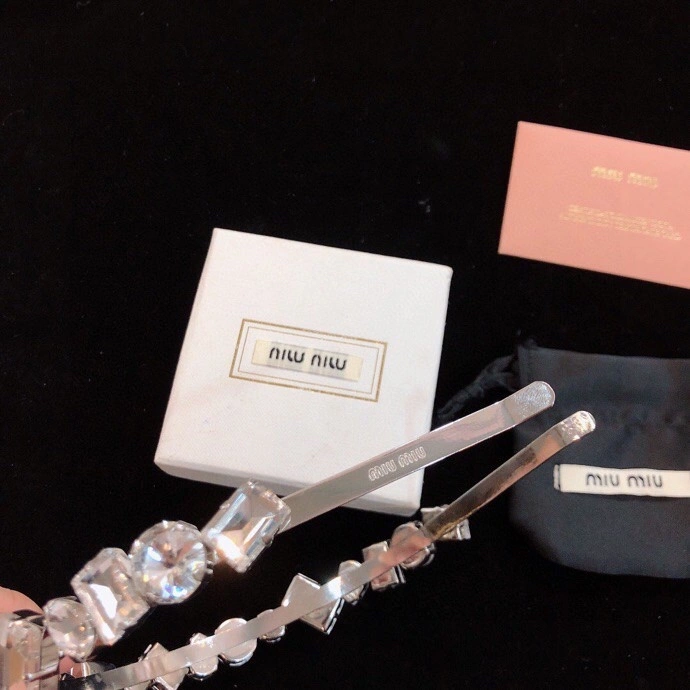 Accurate model Miu Miu Hairpins