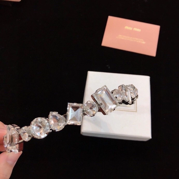 Accurate model Miu Miu Hairpins