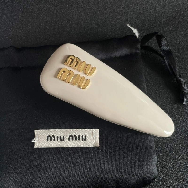 Indistinguishable Miu Miu Hairpins
