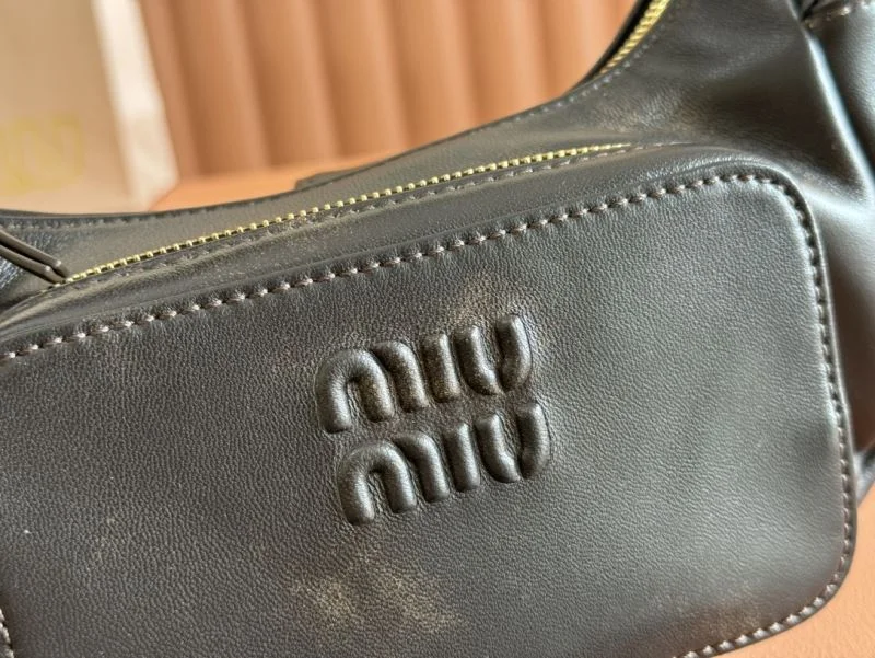 Top mirror Miu Miu Hobo Bags
