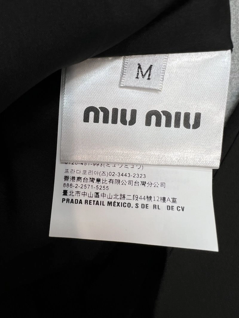 Top mirror Miu Miu Long Suits