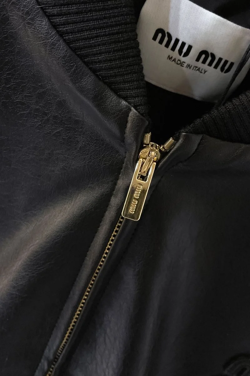 Brand-authenticated Miu Miu Outwear
