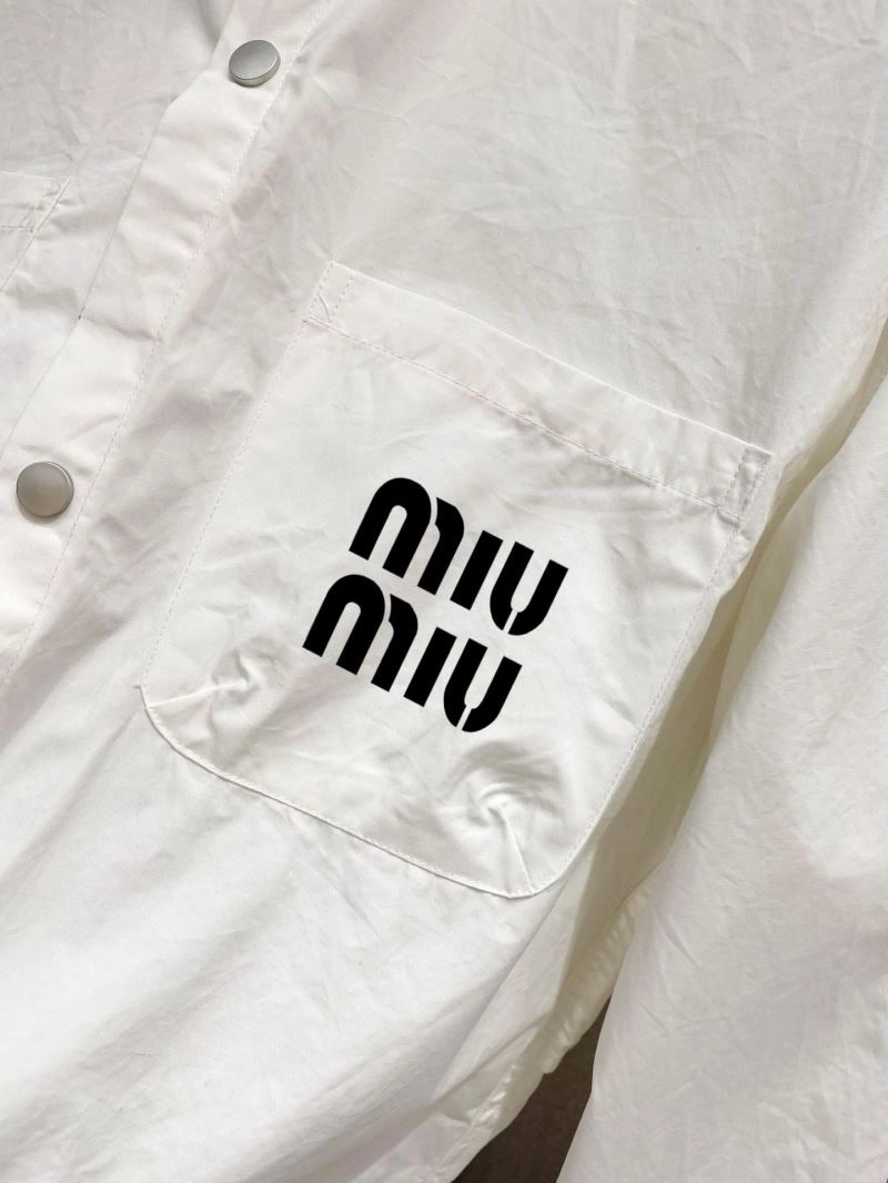 Indistinguishable Miu Miu Outwear