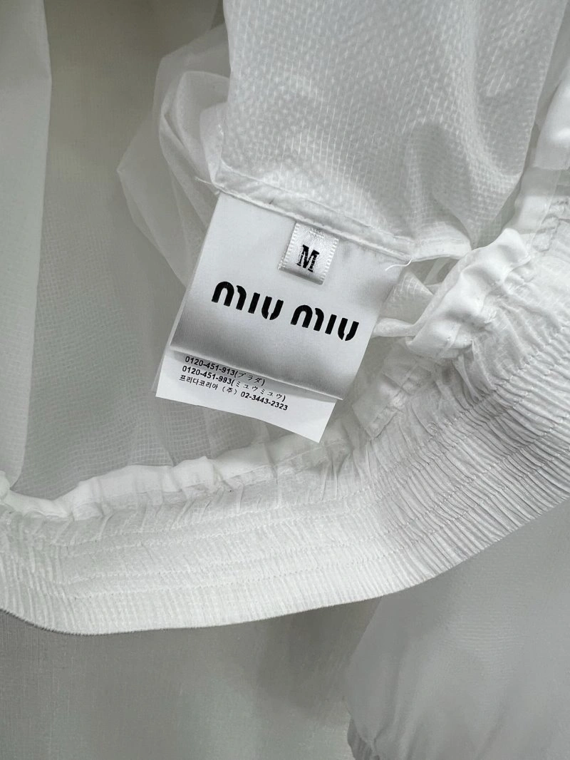 Indistinguishable Miu Miu Outwear