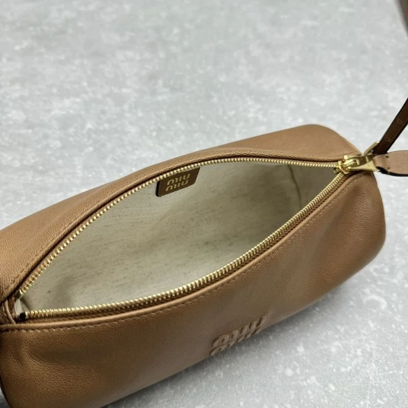 Indistinguishable Miu Miu Round Bags