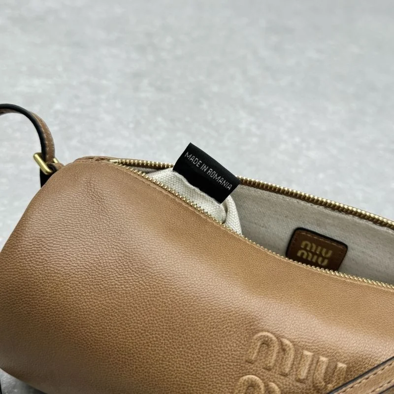 Indistinguishable Miu Miu Round Bags