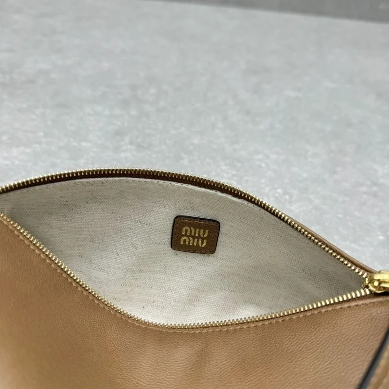 Indistinguishable Miu Miu Round Bags
