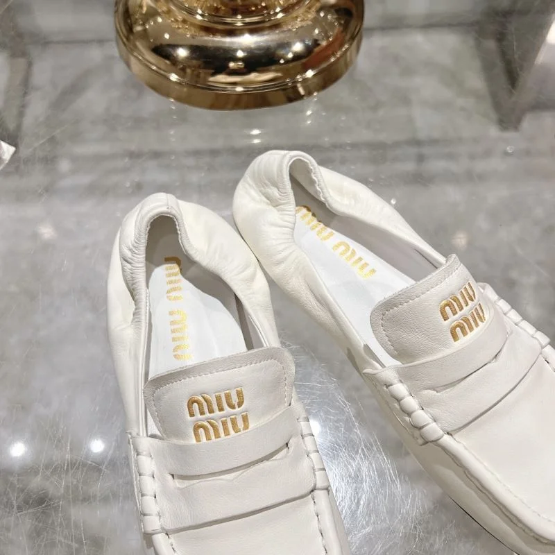 Top mirror Miu Miu Shoes