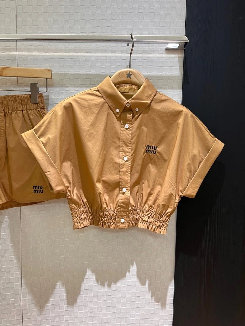 Top mirror Miu Miu Short Suits