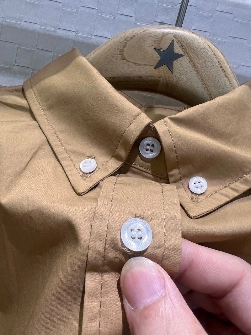 Top mirror Miu Miu Short Suits