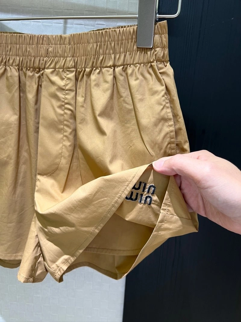 Top mirror Miu Miu Short Suits