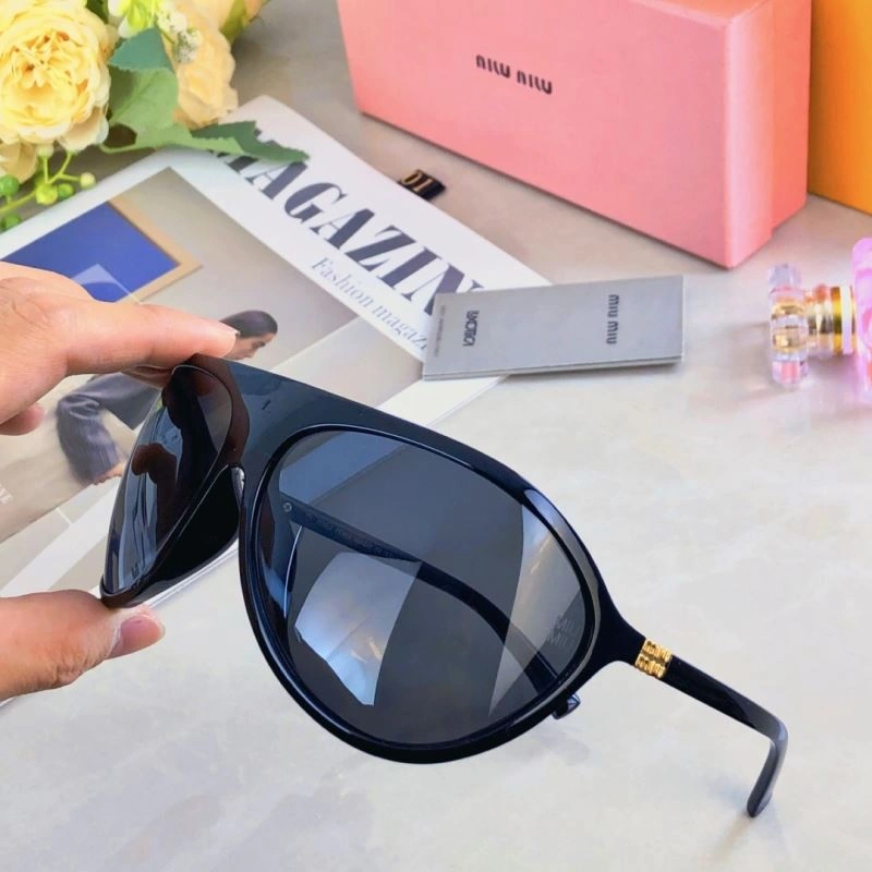 Top mirror Miu Miu Sunglasses
