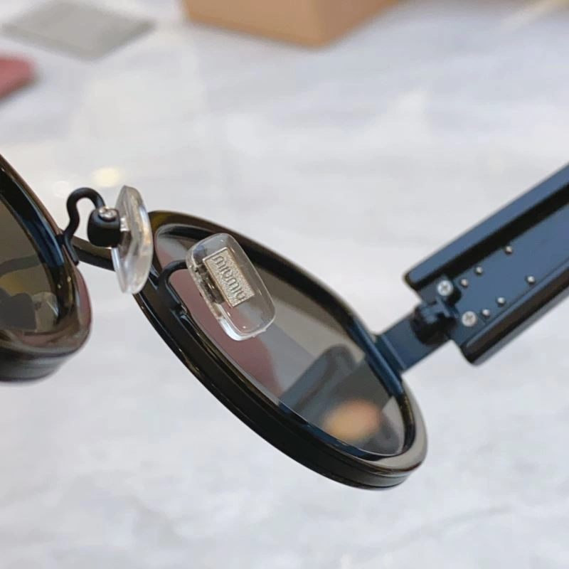 Top mirror Miu Miu Sunglasses