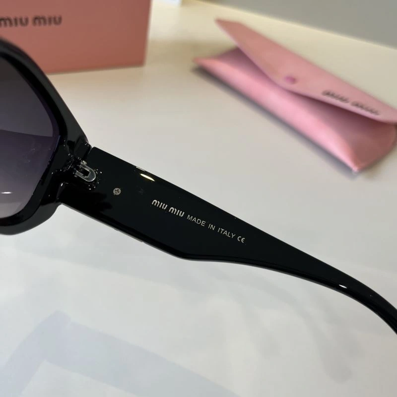 Top mirror Miu Miu Sunglasses