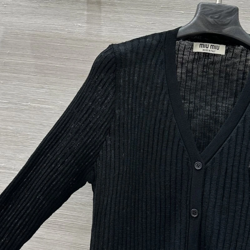 Indistinguishable Miu Miu Sweaters