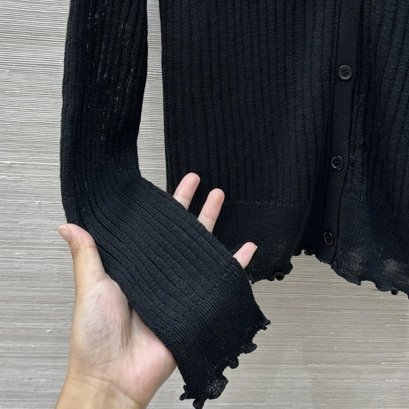 Indistinguishable Miu Miu Sweaters