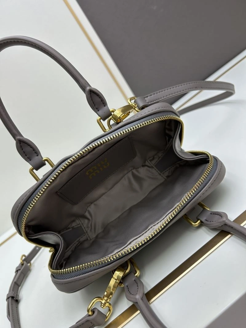 Indistinguishable Miu Miu Top Handle Bags