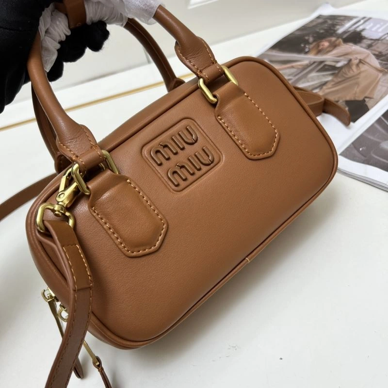 Indistinguishable Miu Miu Top Handle Bags