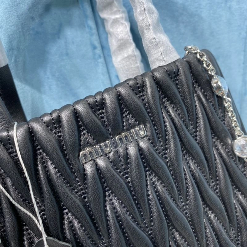 Indistinguishable Miu Miu Top Handle Bags