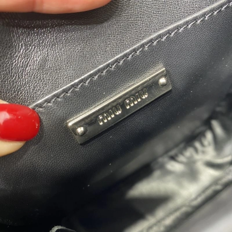 Indistinguishable Miu Miu Top Handle Bags
