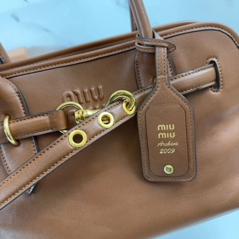 Indistinguishable Miu Miu Top Handle Bags