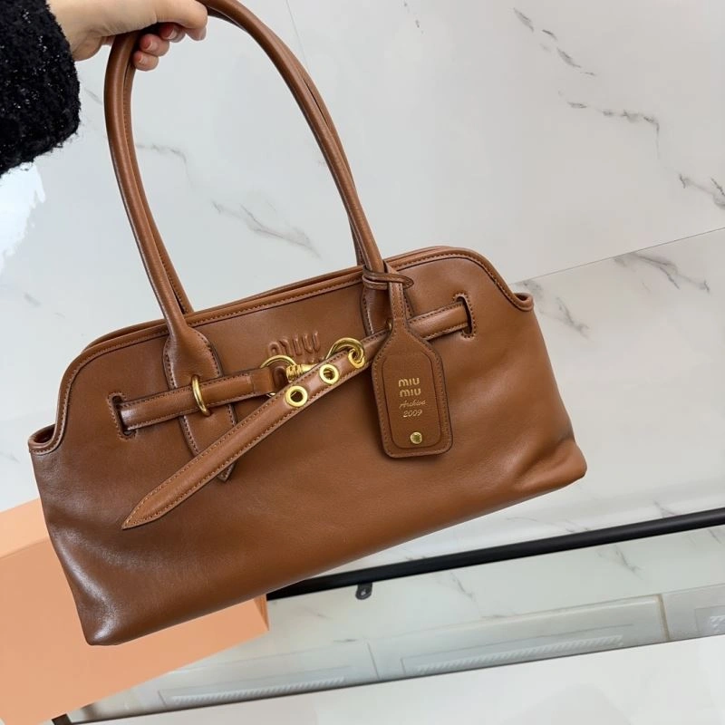 Indistinguishable Miu Miu Top Handle Bags