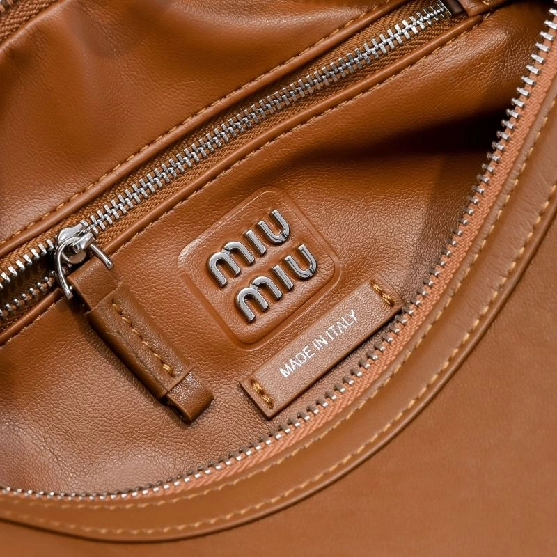 Value-priced Miu Miu Top Handle Bags