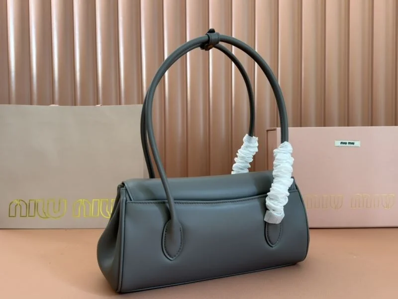 Indistinguishable Miu Miu Top Handle Bags