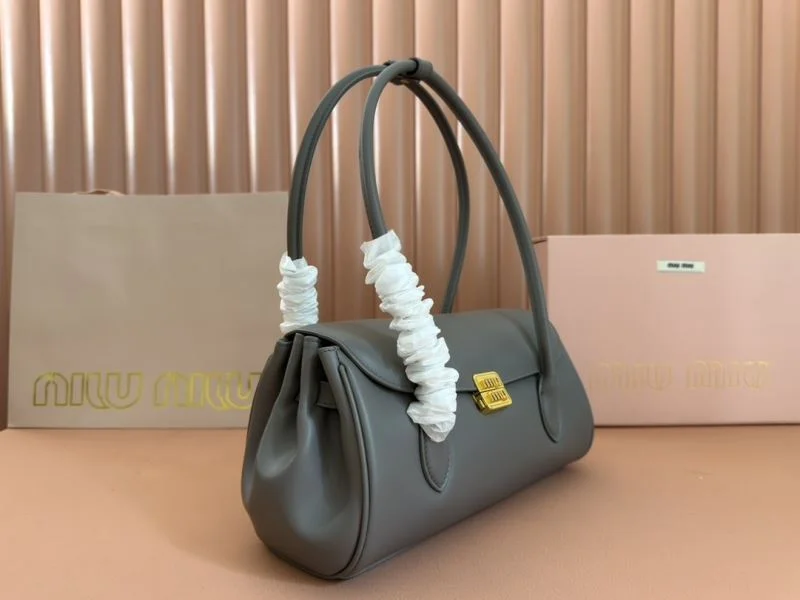 Indistinguishable Miu Miu Top Handle Bags