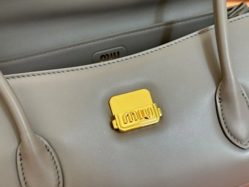 Indistinguishable Miu Miu Top Handle Bags