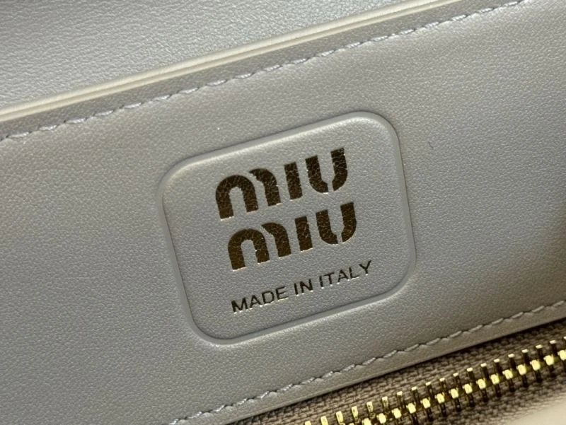 Indistinguishable Miu Miu Top Handle Bags