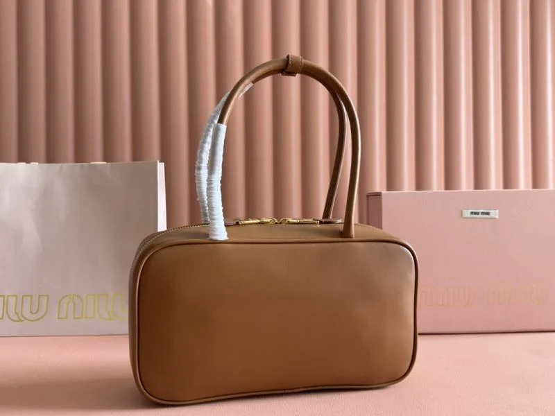 Indistinguishable Miu Miu Top Handle Bags