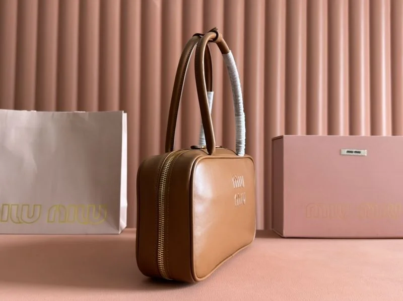 Indistinguishable Miu Miu Top Handle Bags