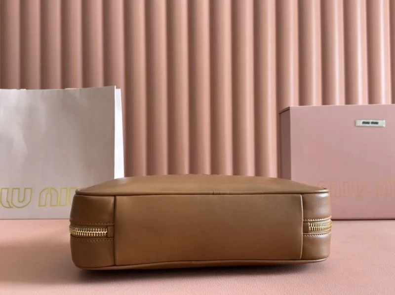 Indistinguishable Miu Miu Top Handle Bags