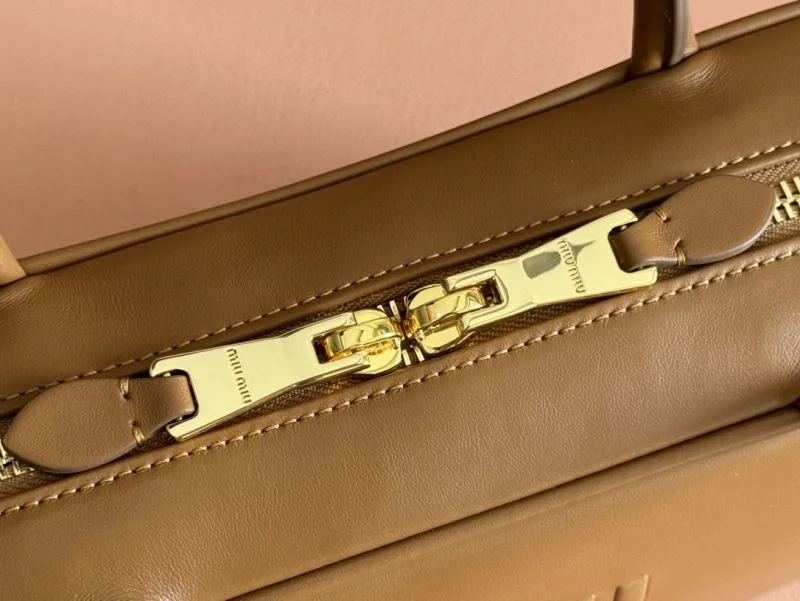 Indistinguishable Miu Miu Top Handle Bags