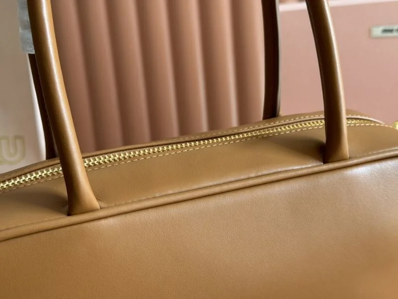 Indistinguishable Miu Miu Top Handle Bags