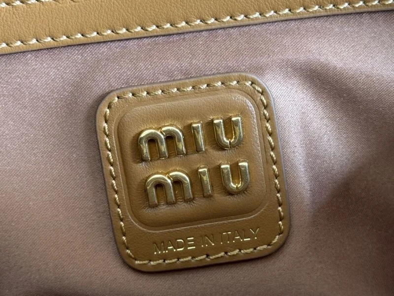 Indistinguishable Miu Miu Top Handle Bags