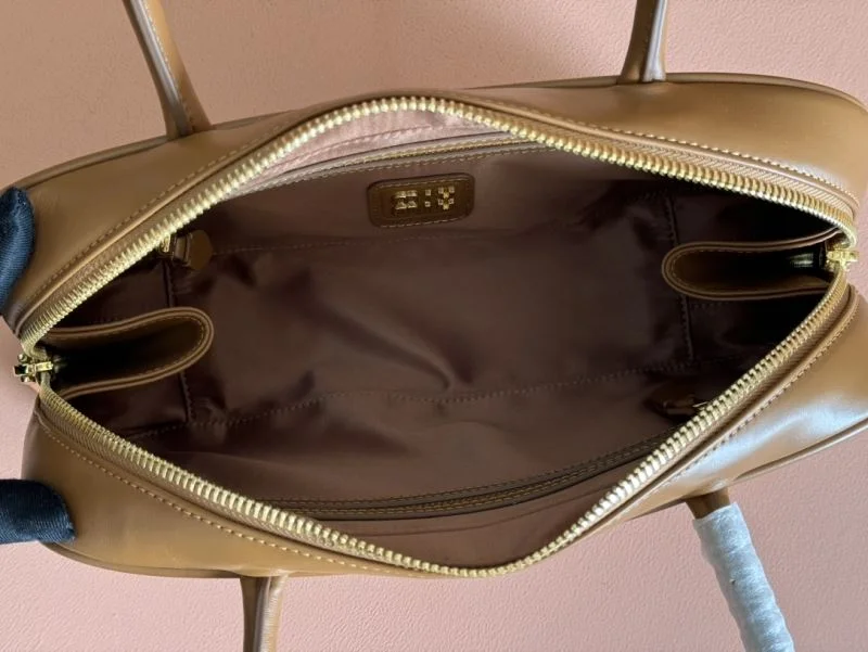 Indistinguishable Miu Miu Top Handle Bags