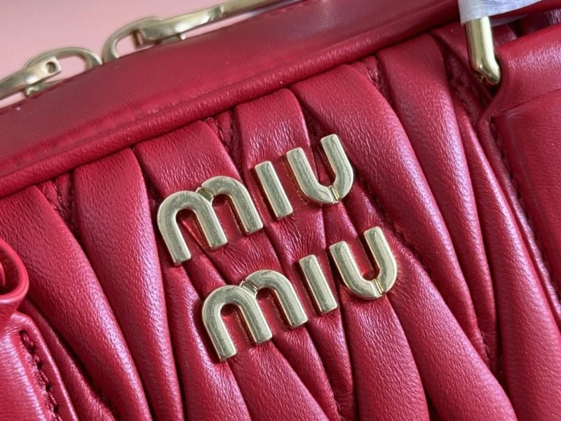 Top mirror Miu Miu Top Handle Bags
