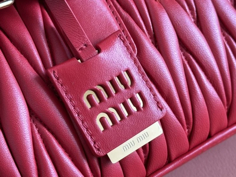 Top mirror Miu Miu Top Handle Bags
