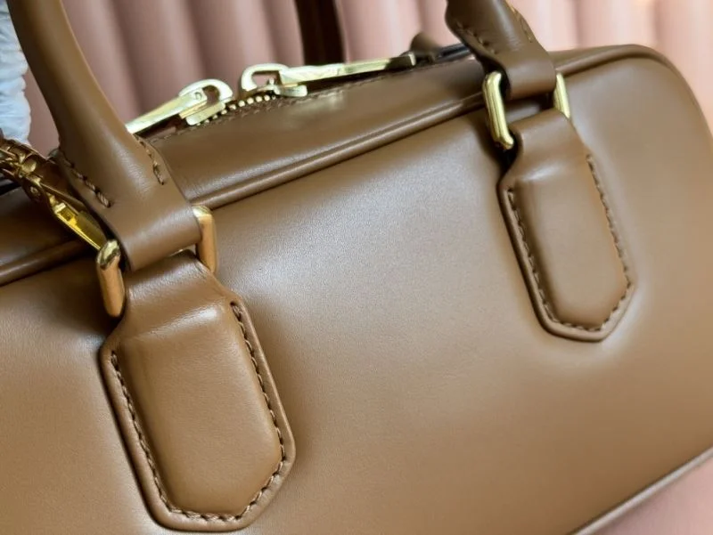 Brand-authenticated Miu Miu Top Handle Bags