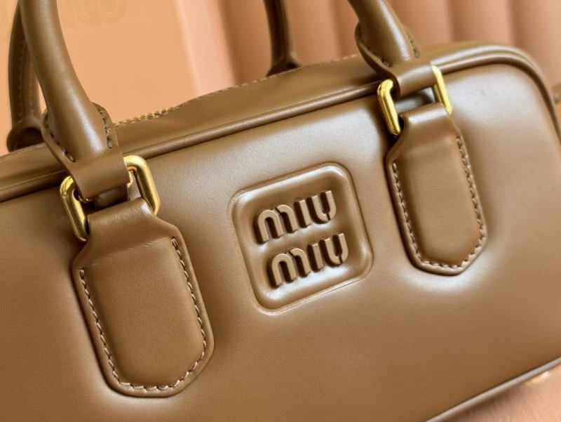 Top mirror Miu Miu Top Handle Bags