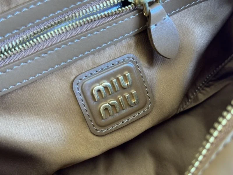 Top mirror Miu Miu Top Handle Bags