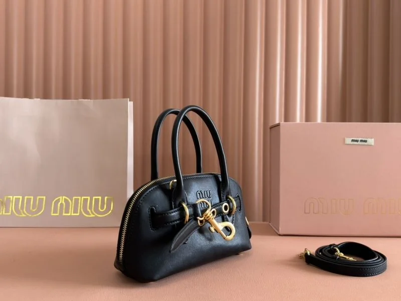 Indistinguishable Miu Miu Top Handle Bags