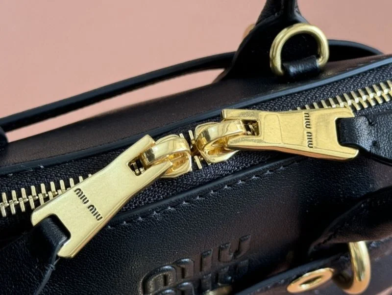 Indistinguishable Miu Miu Top Handle Bags
