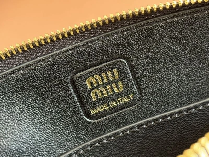 Indistinguishable Miu Miu Top Handle Bags
