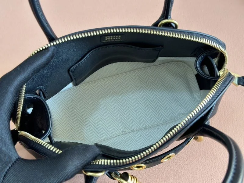 Indistinguishable Miu Miu Top Handle Bags
